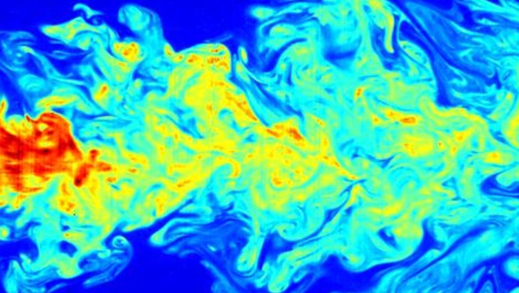 Symmetry breaking and vortex formation in two-dimensional turbulence - IMA